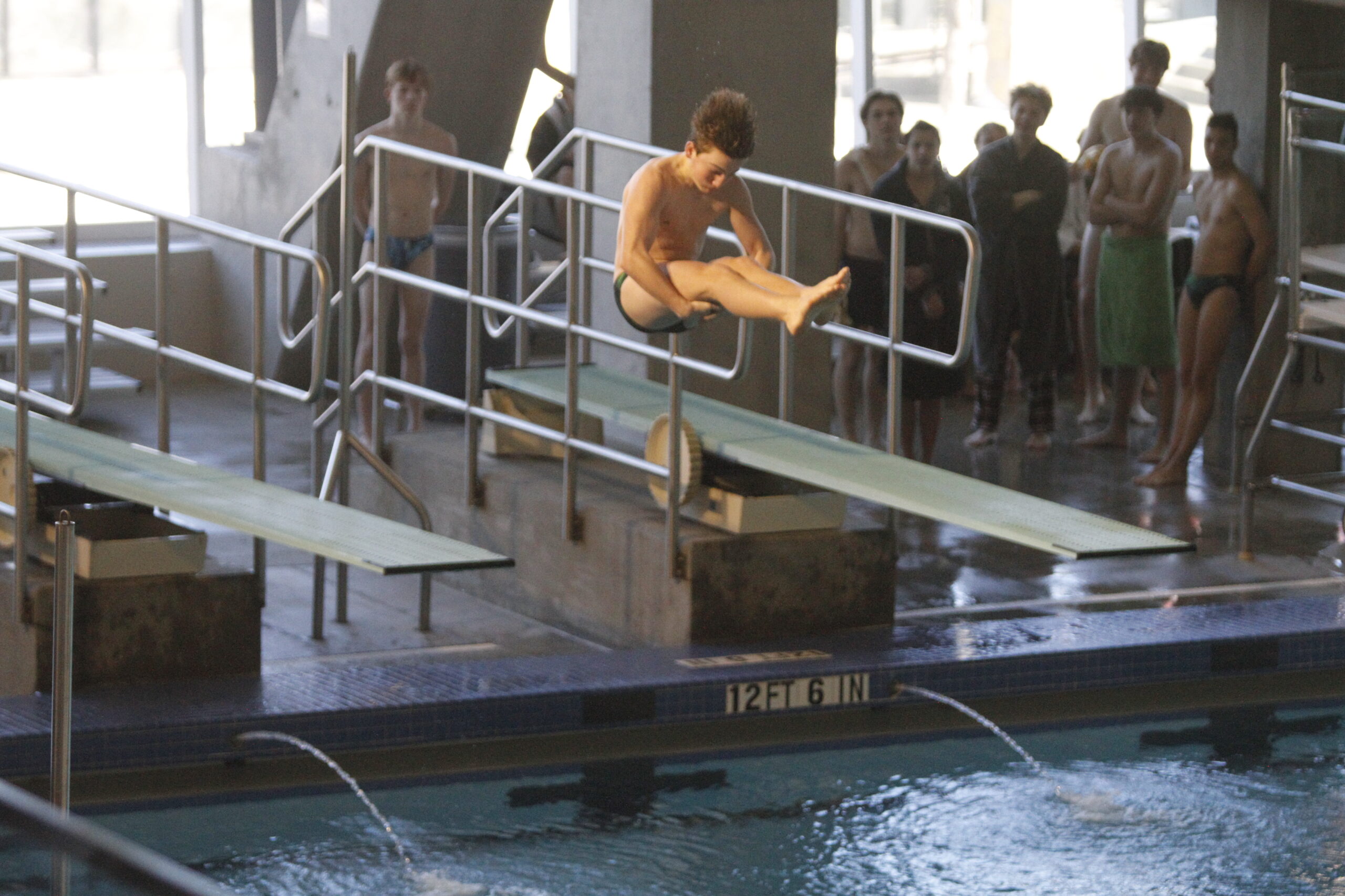 Free State freshman diver advances to diving finals on first day of ...